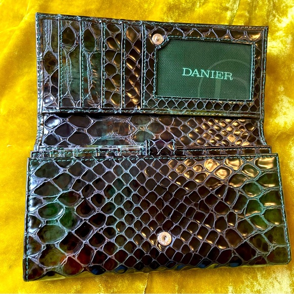 Danier | Bags | Vintage Nwt Danier Etched Leather Trifold Wallet ...